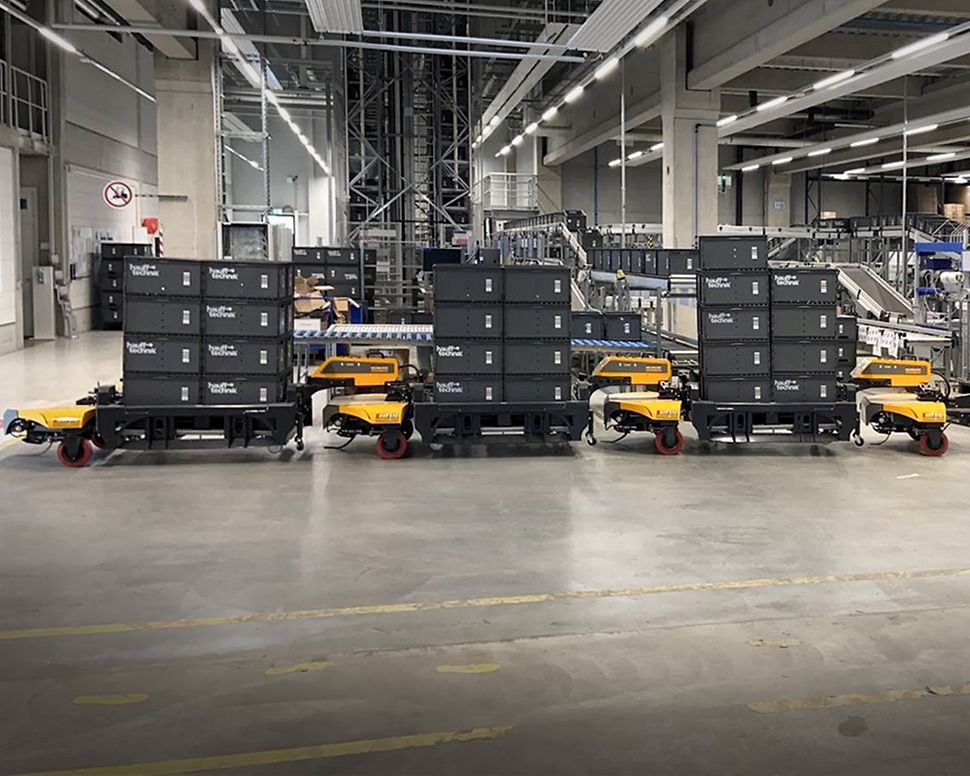 Efficient warehousing pulled by a tugger train system